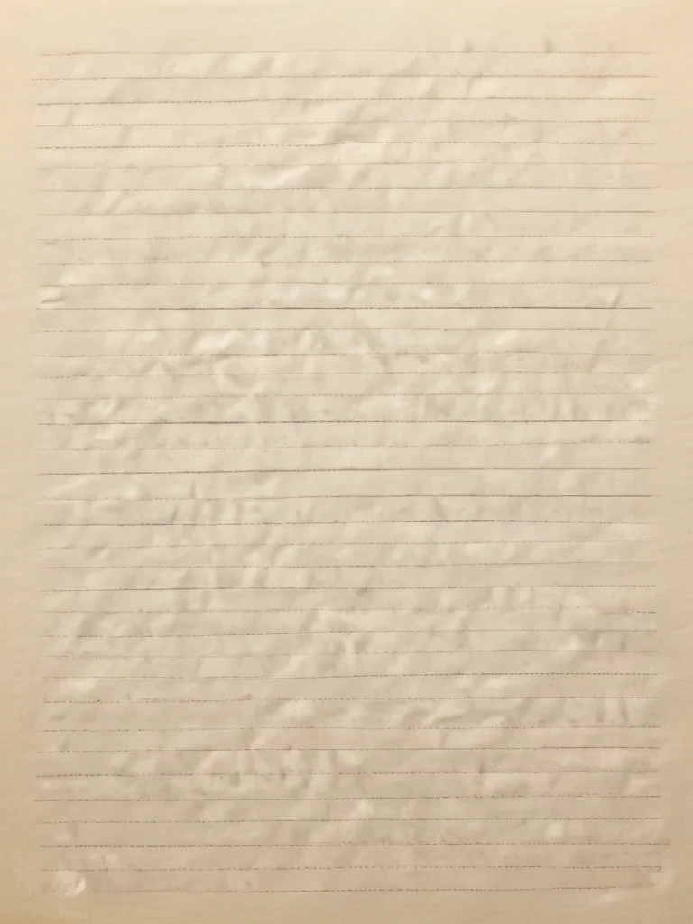 A Blank Page with Subtle Texture and Lightly Printed Lines for Writing