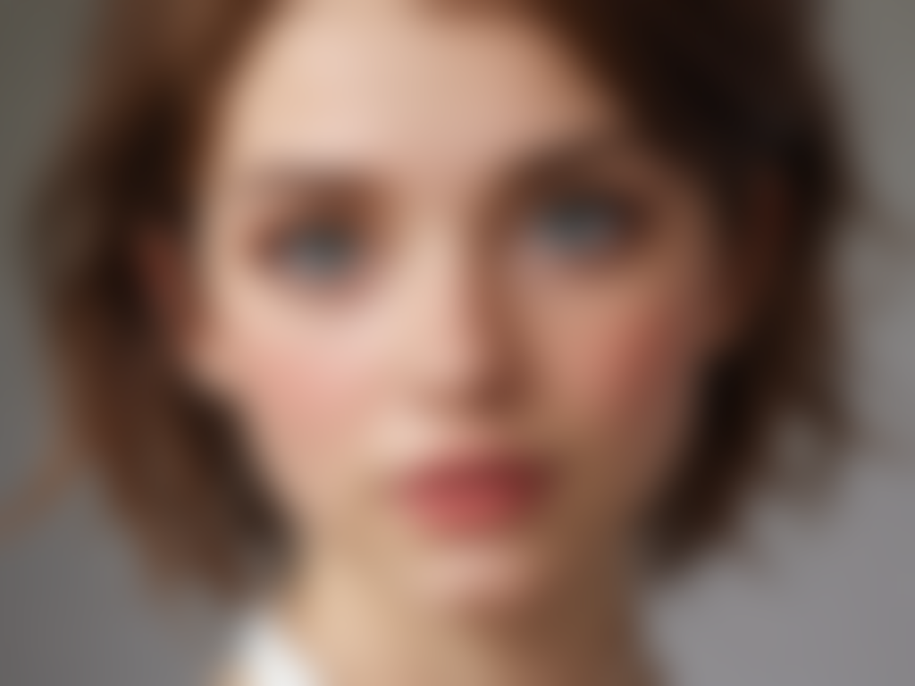 Portrait of a Young Woman with Soft Features and Expressive Eyes