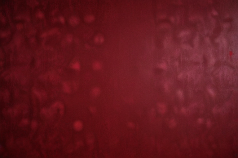 Elegant Deep Red Background with Subtle Texture and Soft Highlights