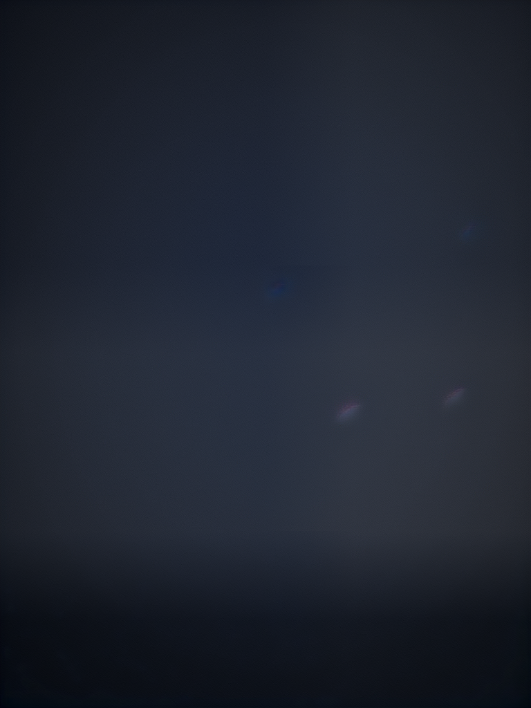 Abstract Dark Background with Subtle Hints of Light and Color Variations.