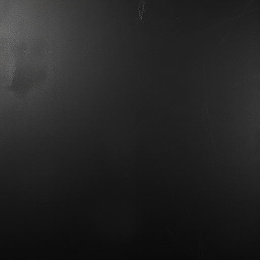 A Smooth, Dark Surface with Subtle Textures and Fleeting Light Reflections.