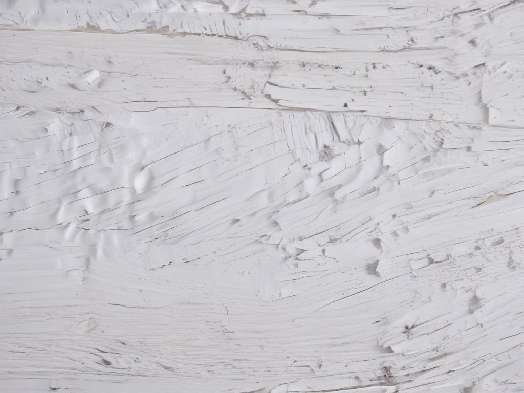 Textured White Surface with Subtle Variations and Striations in Paint.