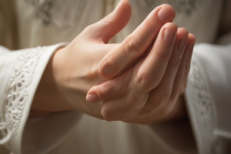 Close-Up of Hands in Prayer Position, Symbolizing Peace and Reflection