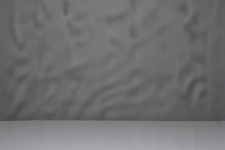 A Softly Textured Gray Background with Subtle Patterns and Depth Effects.