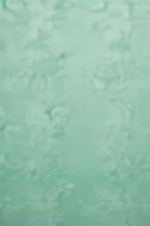 A Soft and Subtle Mint Green Texture with Gentle Patterns and Depth.