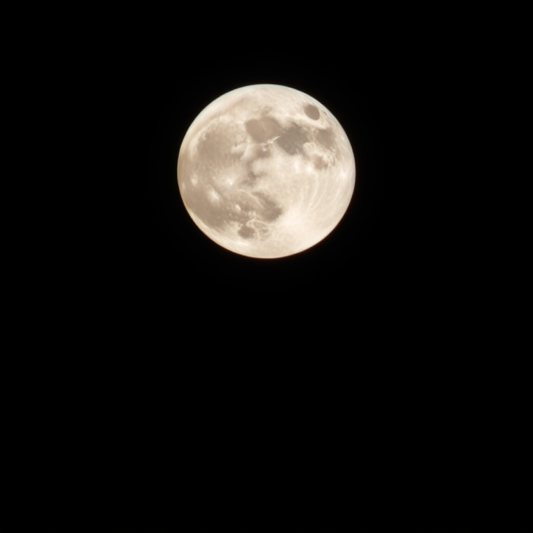 Majestic Full Moon Illuminates the Night Sky with Glowing Radiance