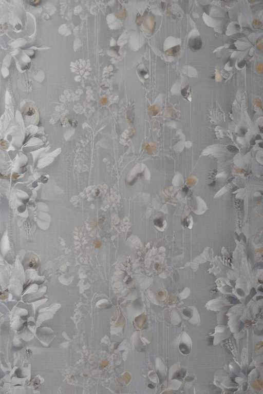 Elegant Floral Pattern on a Soft Gray Fabric with Subtle Details
