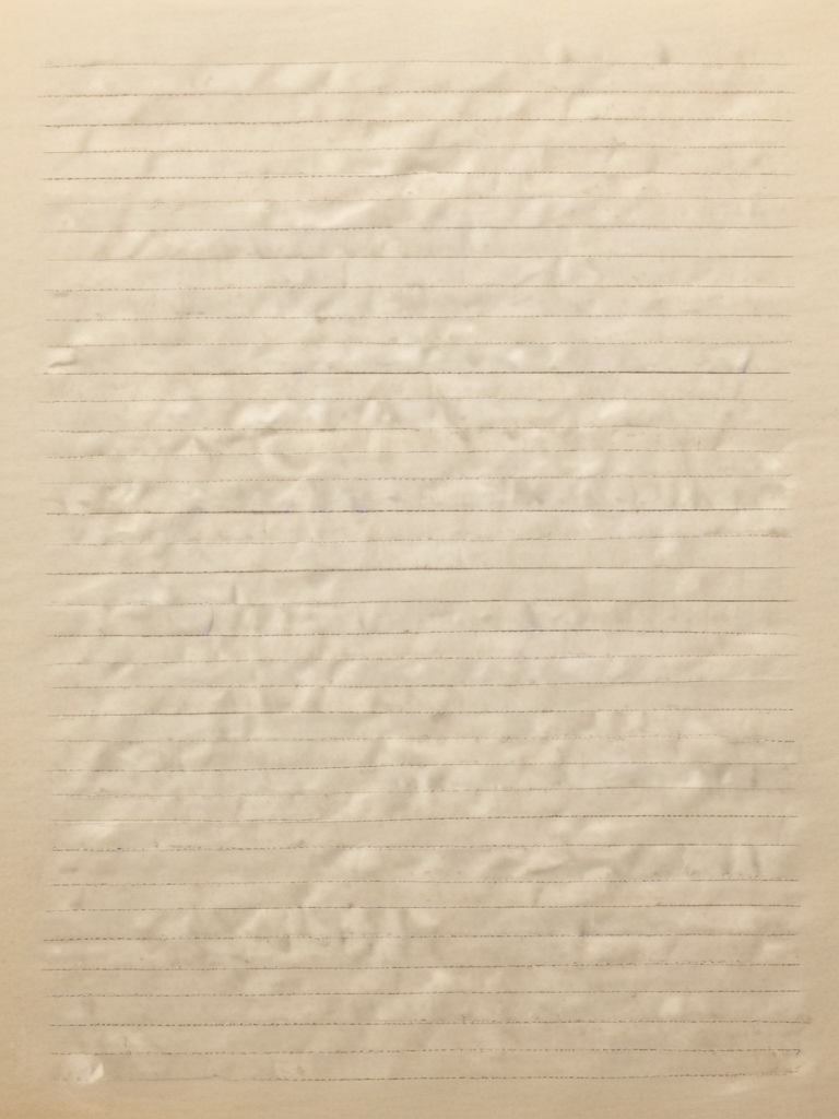 A Blank Page with Subtle Texture and Lightly Printed Lines for Writing