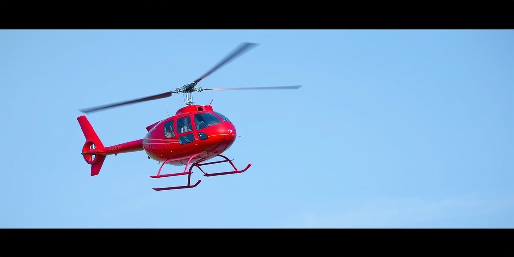A Bright Red Helicopter Flying Gracefully Against a Clear Blue Sky.