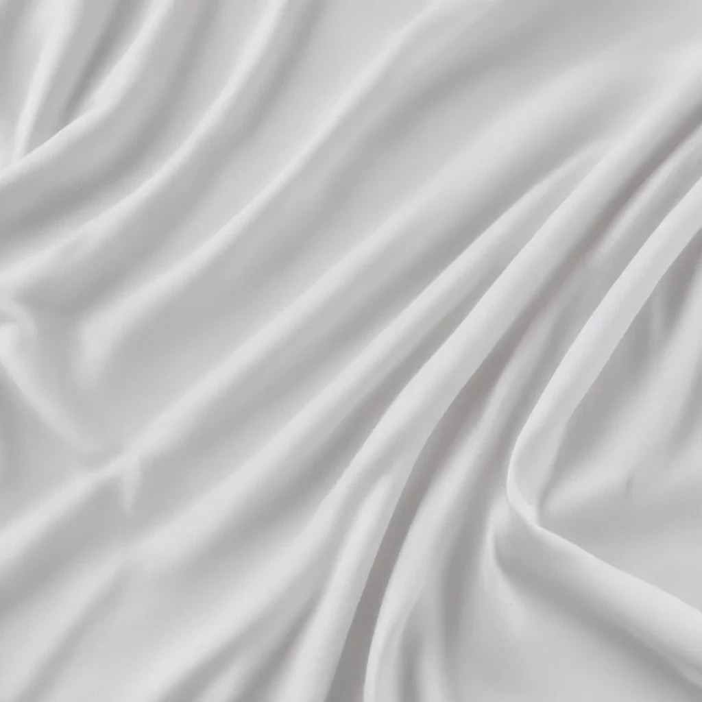 Soft, Flowing White Fabric with Elegant Drapery and Subtle Texture