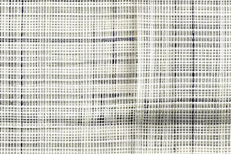 Intricate Weave of Textured Fabric Showcasing a Harmonious Pattern Design