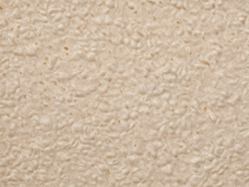 Textured Surface of Light Beige Material with Subtle Patterns and Depth