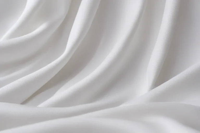 Soft and Elegant Drapery of Smooth White Fabric with Gentle Waves