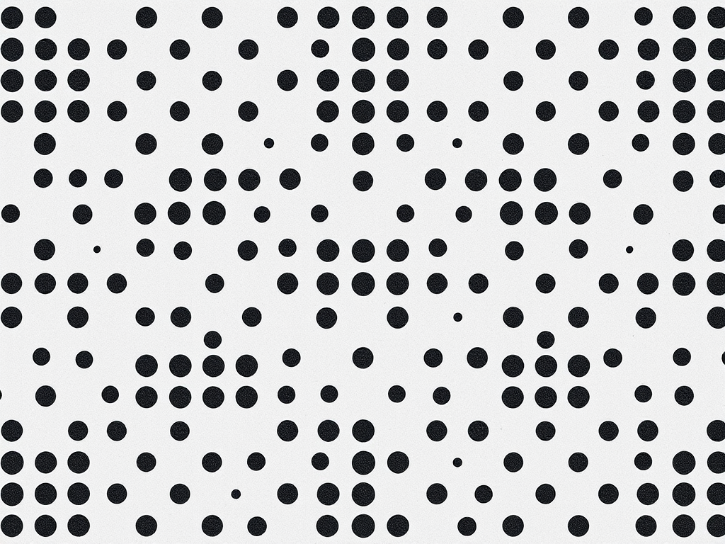 Abstract Pattern of Varying Sized Black Dots on a White Background